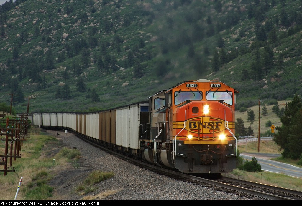 BNSF 8937 and with the help of 4-more MACs work the 'roller-coaster' terrain of the Joint-Line ...
